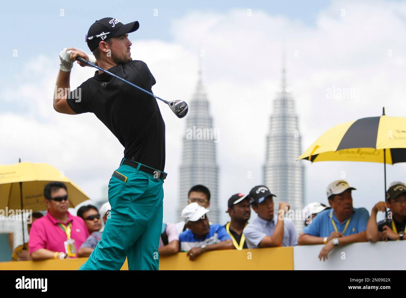 Nathan Holman of Australia follows his shot from the tenth hole during ...