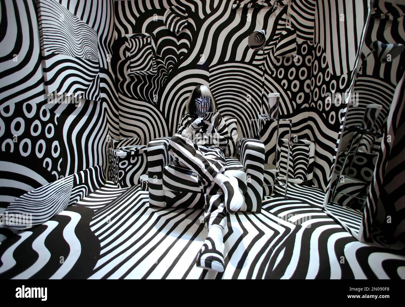 Model feebee poses as part of art installation “Dazzle room” made by ...