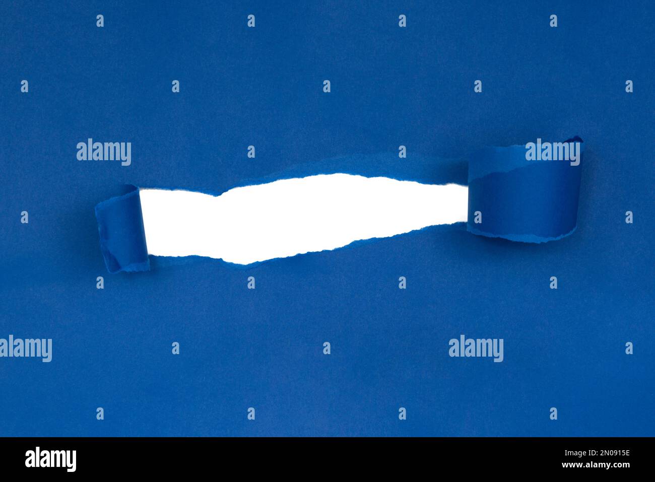 Blue torn sheet of paper with whole space for text isolated Stock Photo ...