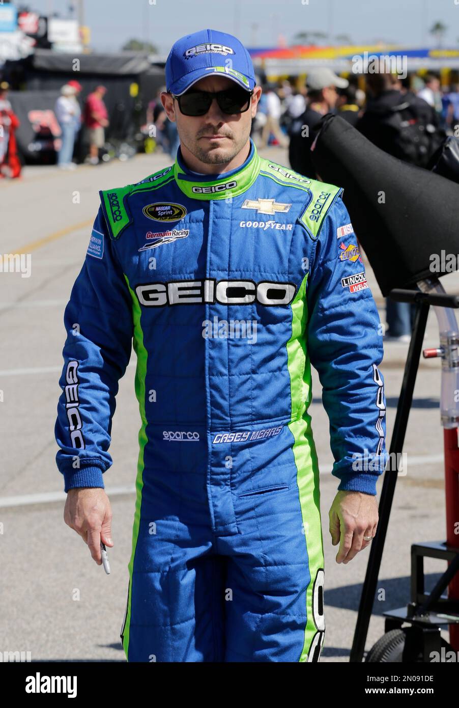 Casey Mears walks through the garage during practice for Sunday's ...