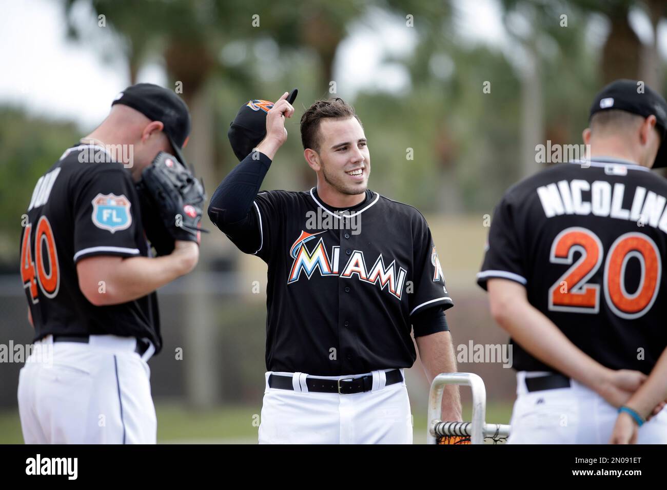 Miami Marlins pitcher Jose Fernandez, center, talks with fellow ...