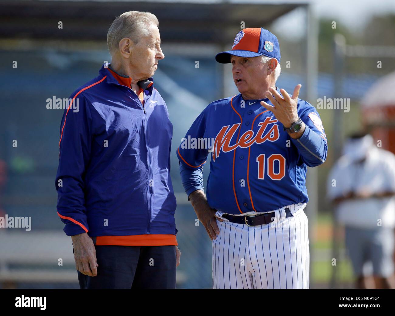 New York Mets owner Fred Wilpon, left, talks with manager Terry Collins ...