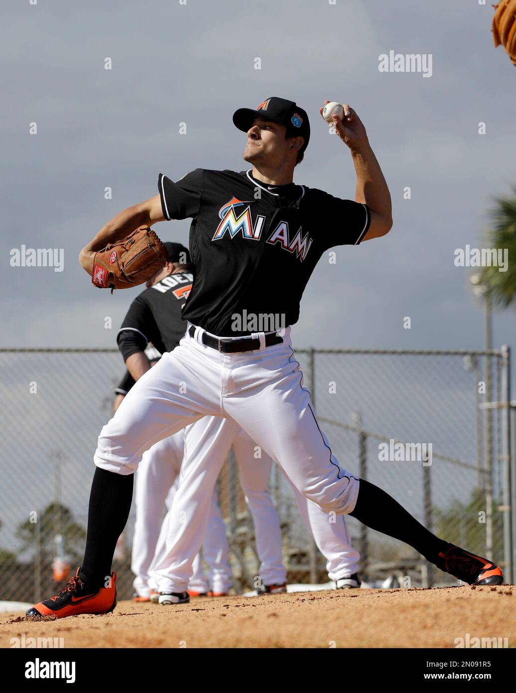 Miami Marlins pitcher Brad Hand throws a bullpen session during spring ...