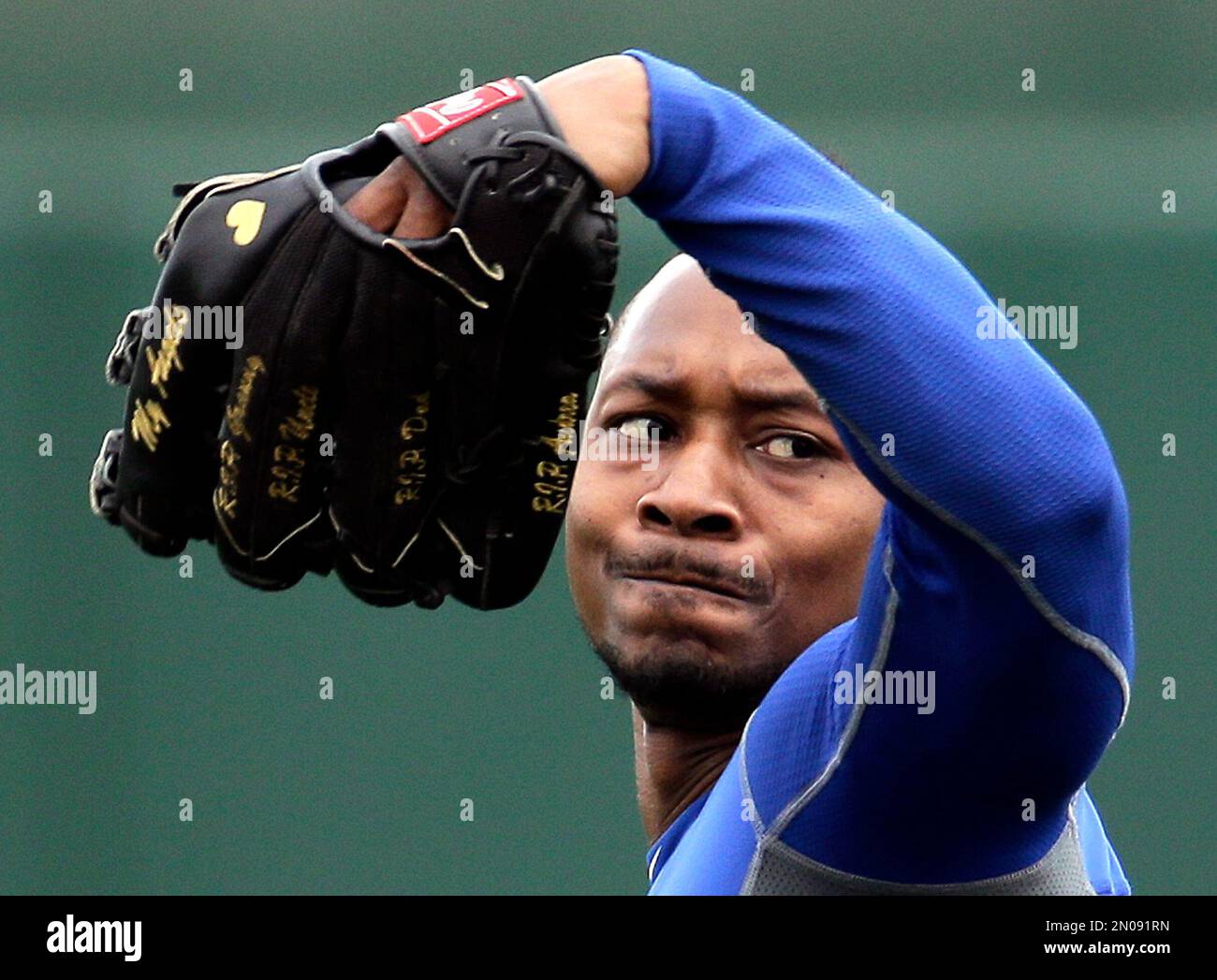 Kansas City Royals' Jarrod Dyson throws during spring training baseball ...