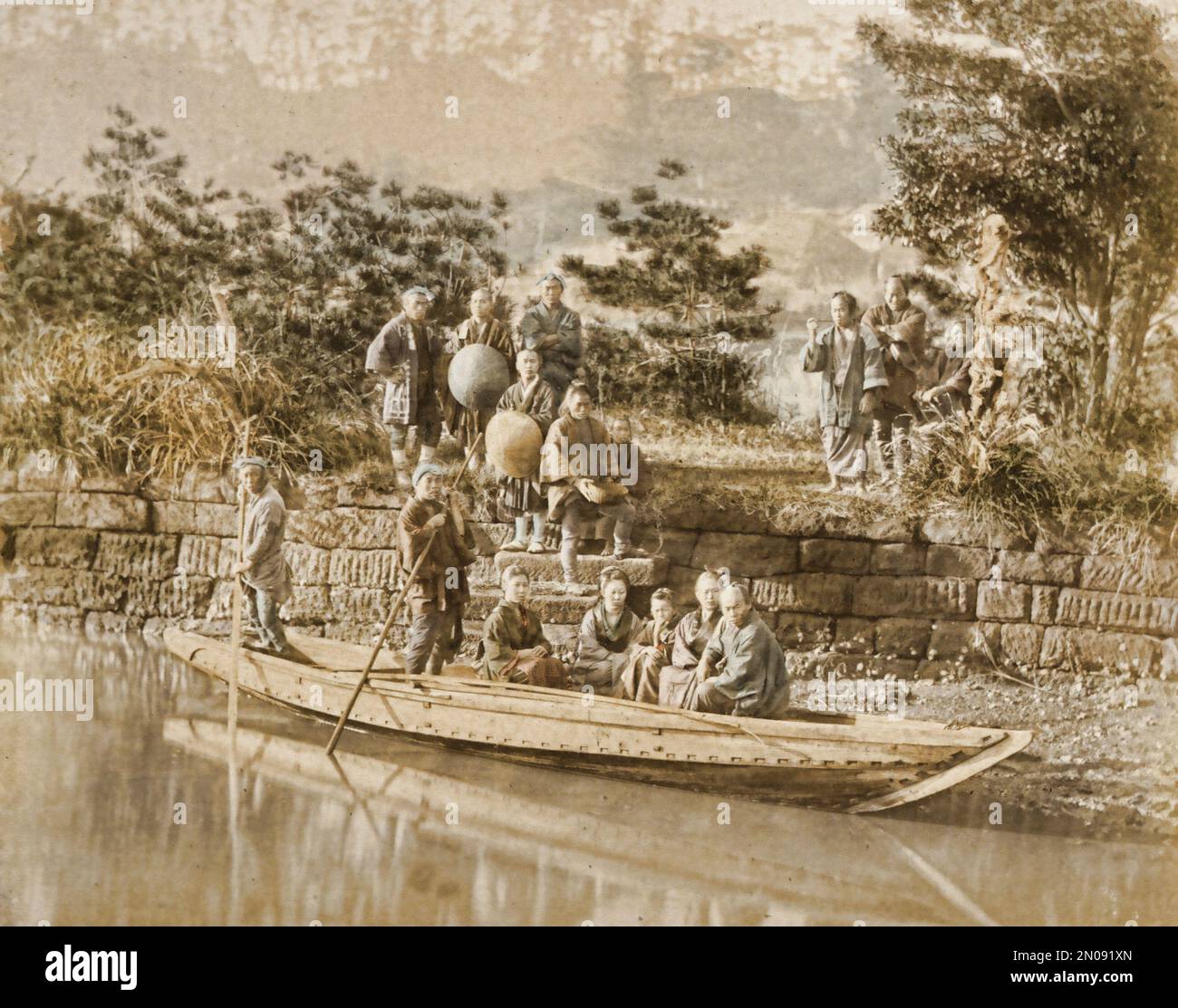 A photograph of Japanese people in a boat, published in Views ...