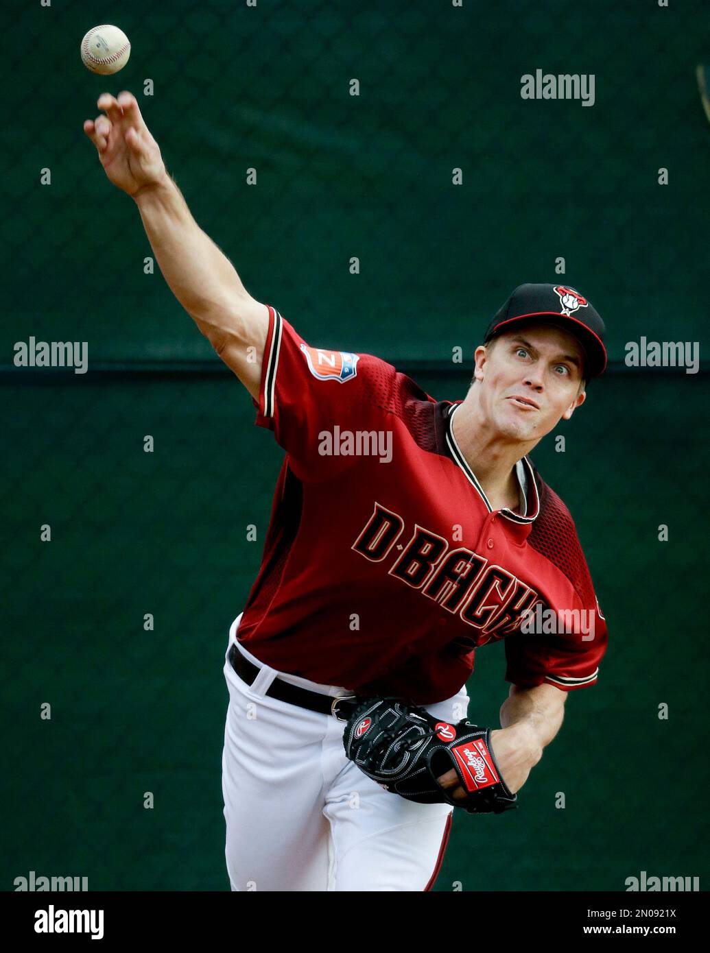 Arizona Diamondbacks pitcher Zack Greinke throws during a spring baseball season practice in ...