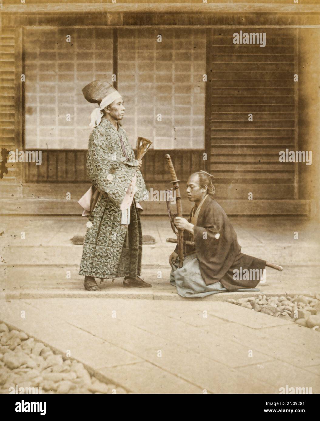 A photograph of a Japanese Samurai kneeling for his master. Published ...