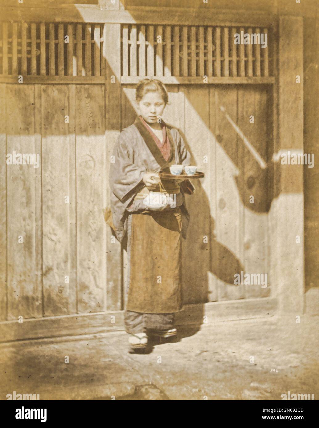 A photograph of a Japanese woman serving tea. Published in Views ...