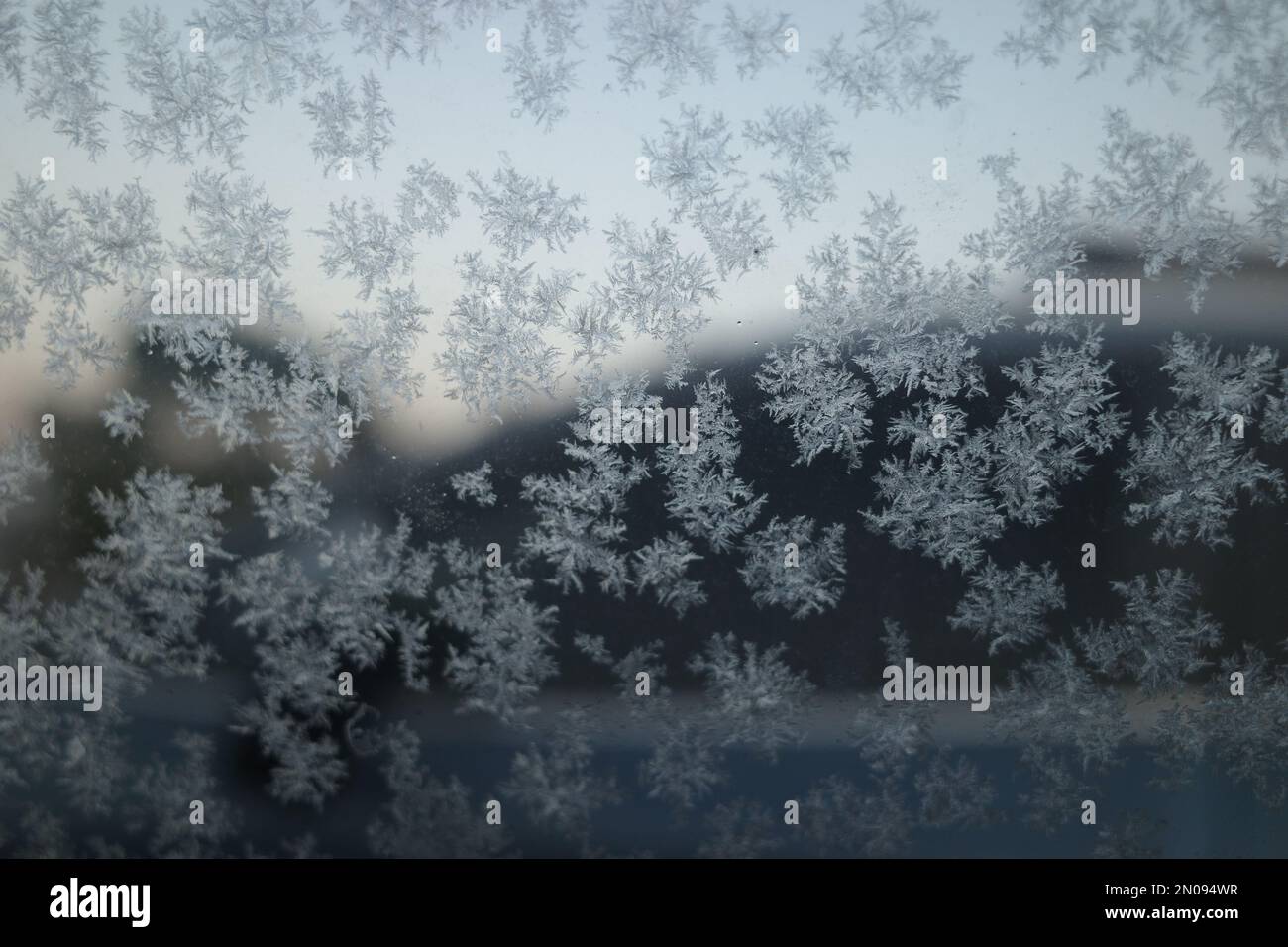 car window covered with snowflakes Stock Photo - Alamy
