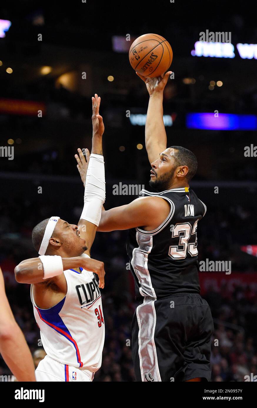 San Antonio Spurs center Boris Diaw, right, of France, shoots as Los ...