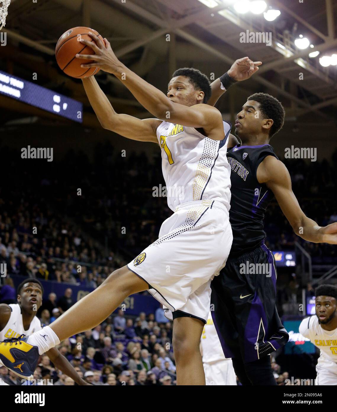 California's Ivan Rabb (1) pulls down a rebound in front of Washington ...