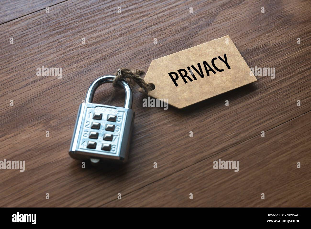 A padlock with number attached to a tag written with Privacy Stock ...