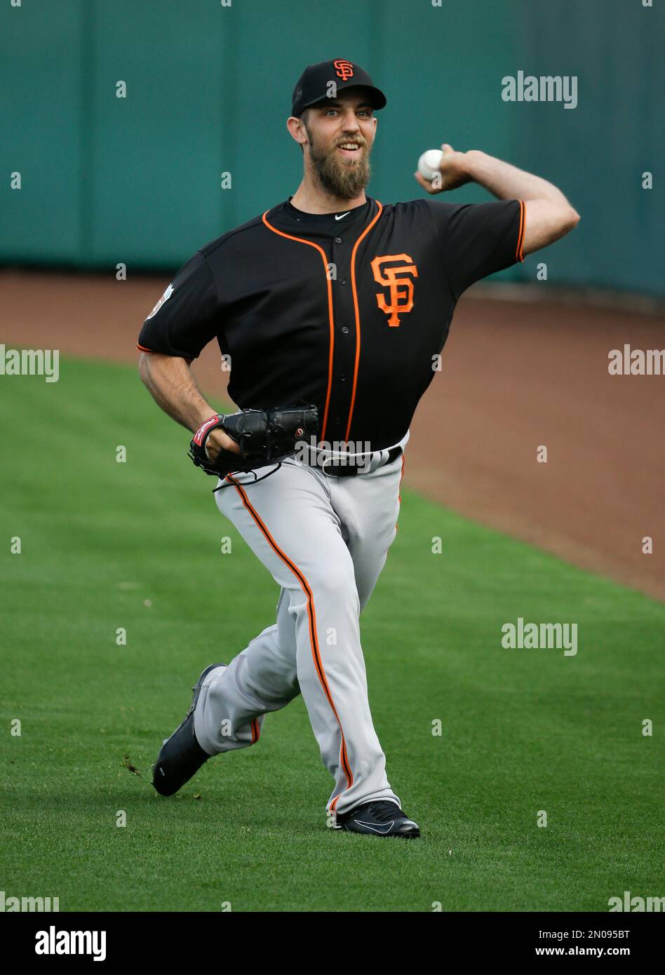 San Francisco Giants pitcher Madison Bumgarner throws during practice ...