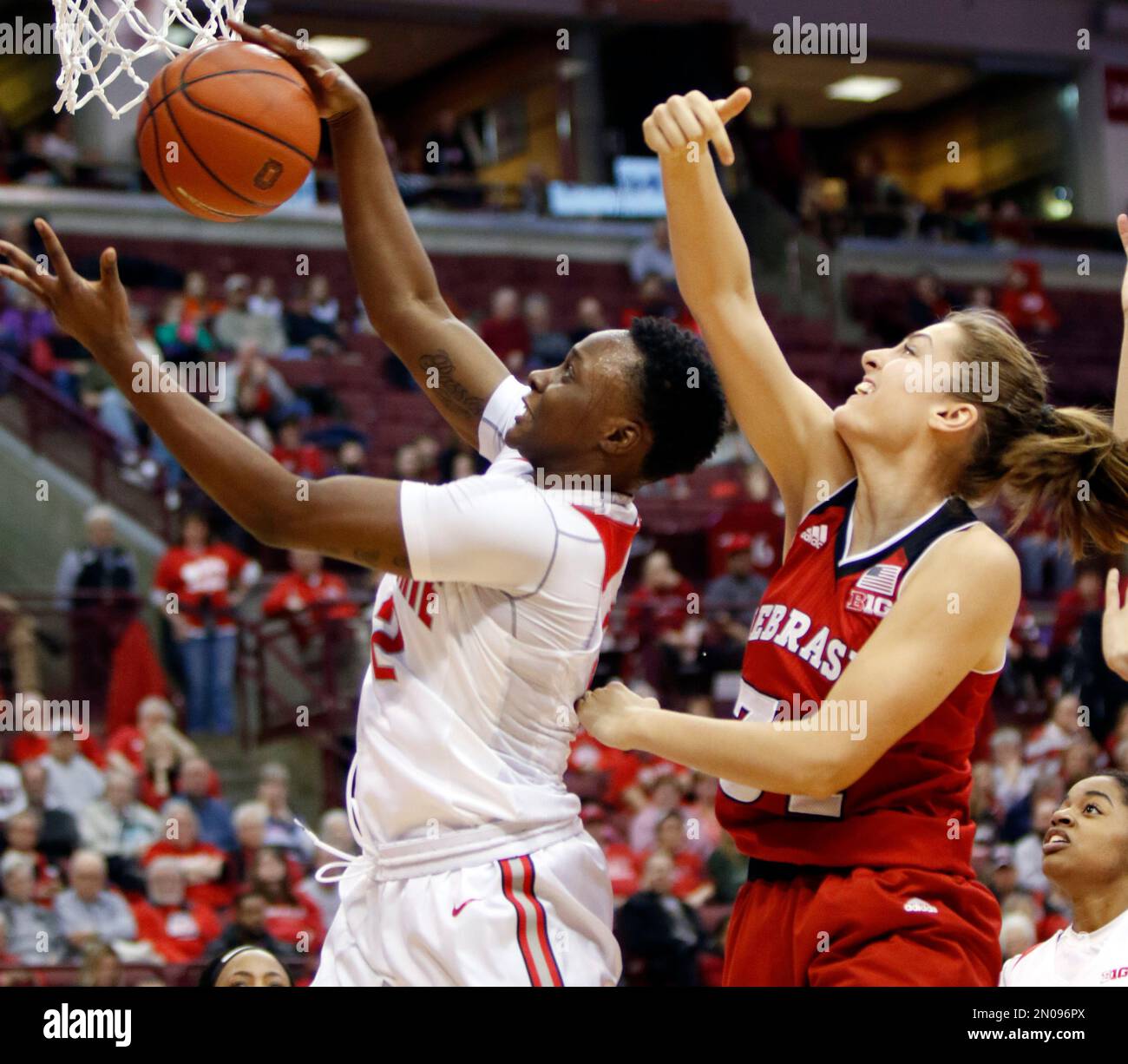 Ohio State's Shayla Cooper, left, grabs a rebound against Nebraska's ...