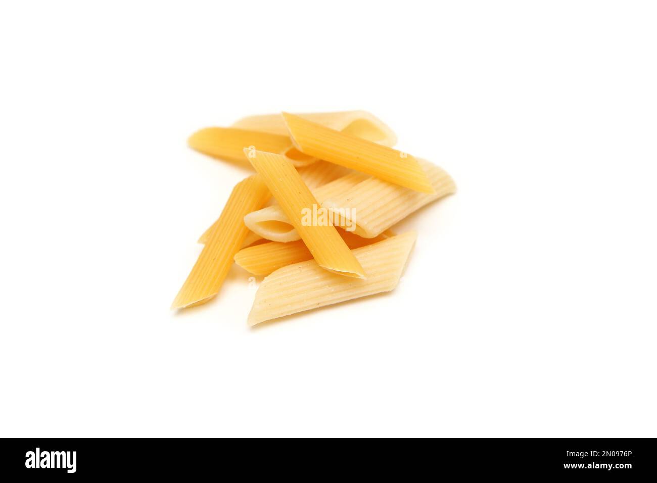 The comparison of the boiled and dry pasta. Different size and colors ...