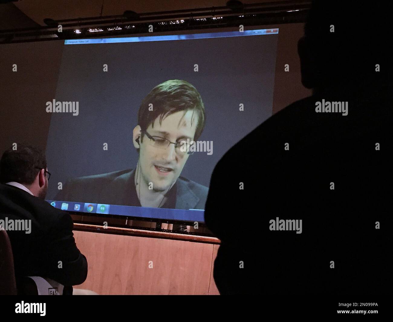 Former National Security Agency contractor Edward Snowden, center ...