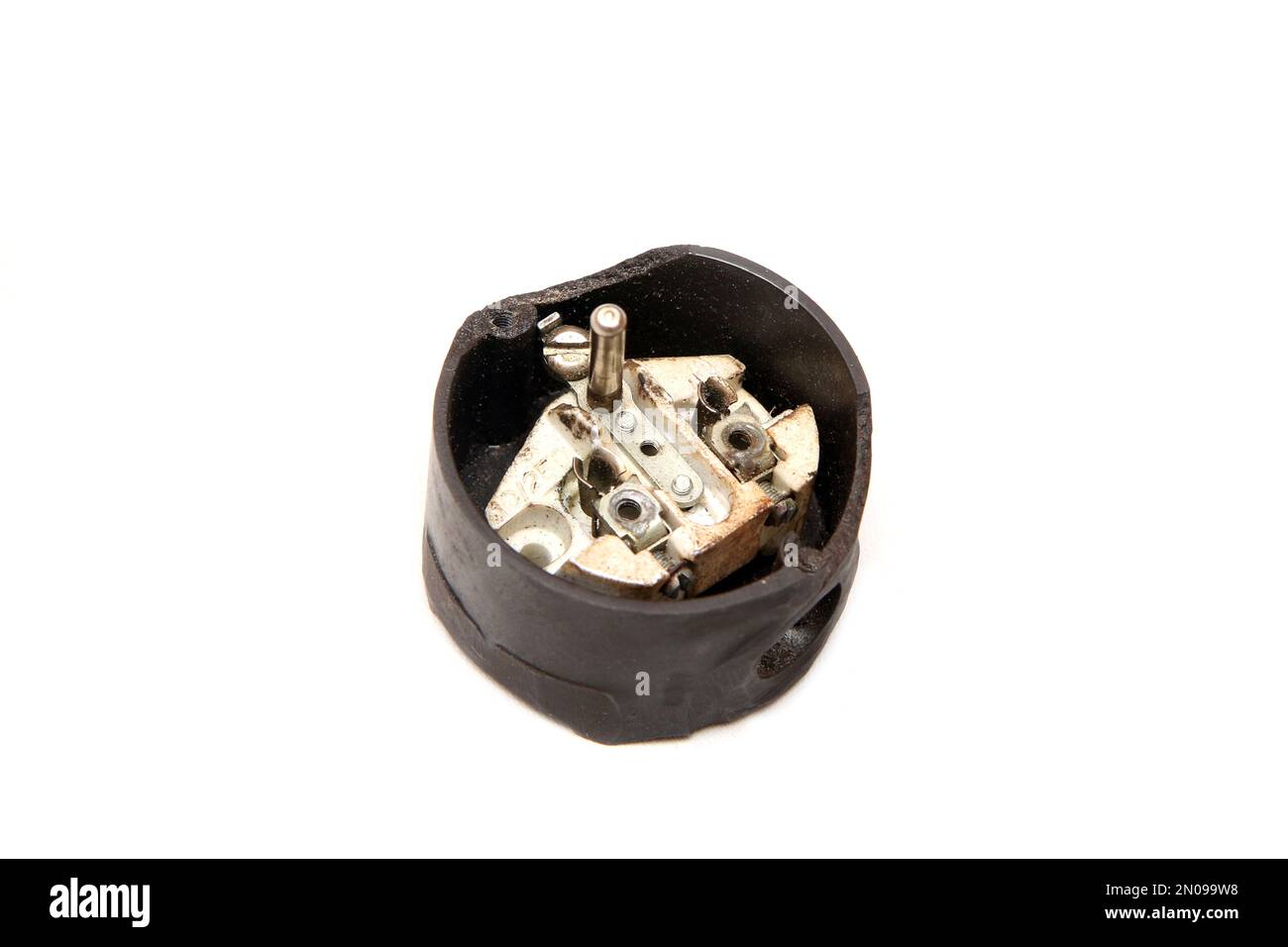 The old used wall socket from the old machine isolated in a white ...