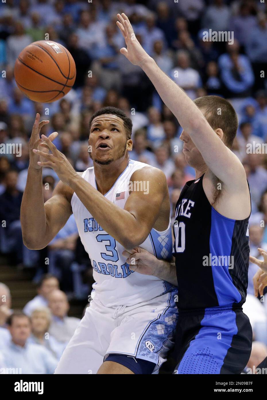 North Carolina's Kennedy Meeks reaches for the ball as Duke's Marshall ...
