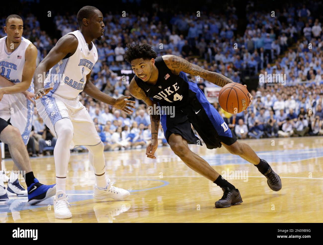 North Carolina's Theo Pinson defends against Duke's Brandon Ingram (14 ...