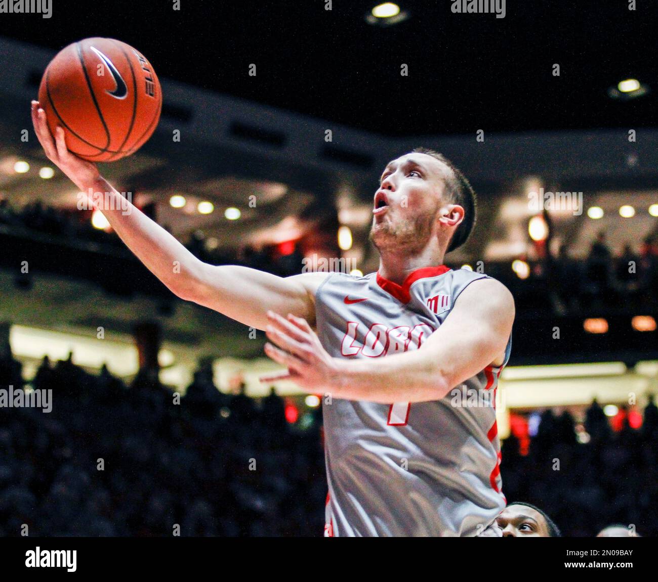 New Mexico's Cullen Neal (1) finishes a fast break with a layup during ...