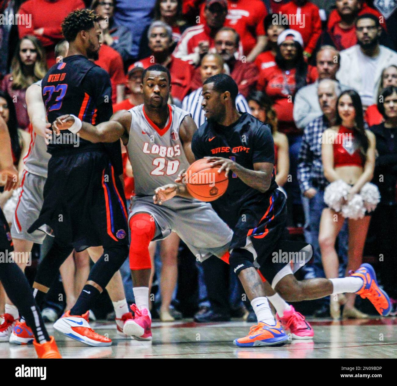 Boise State's Mikey Thompson (1) dribbles around New Mexico's Sam ...