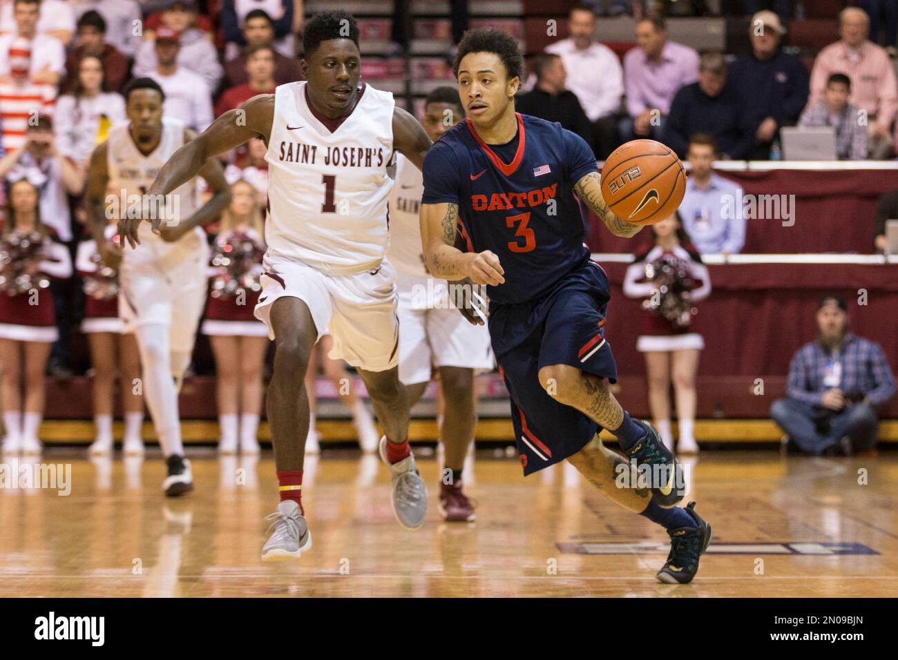 Dayton's Kyle Davis (3) in action against Saint Joseph's Shavar Newkirk ...