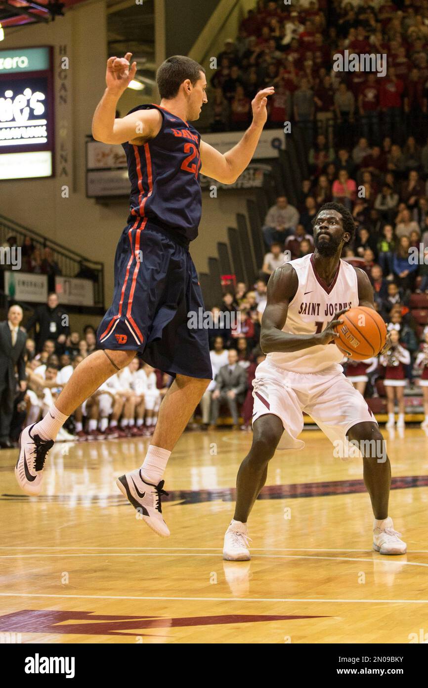 Saint Joseph's Isaiah Miles (15) in action against Dayton's Bobby ...