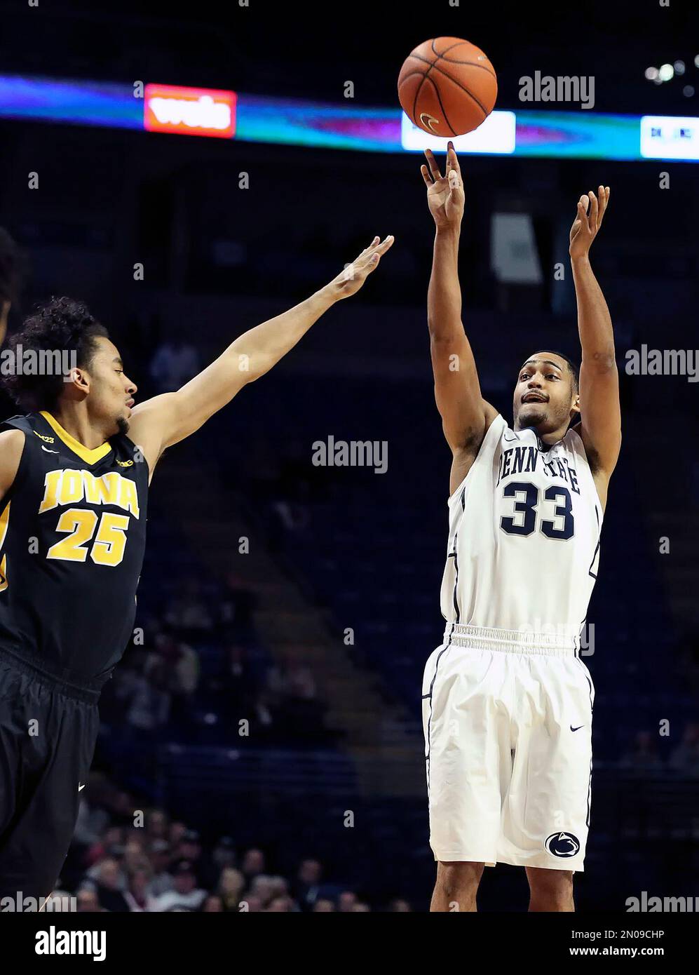 Penn State guard Shep Garner (33) hits a three pointer as Iowa forward ...