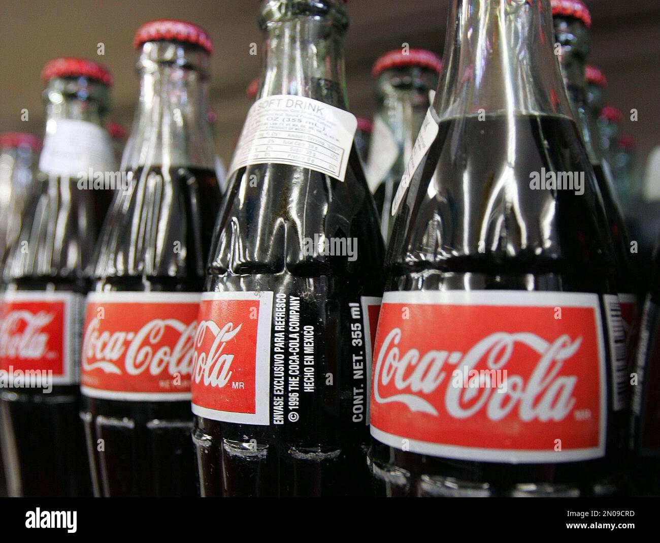 FILE - In this Nov. 3, 2004, file photo, bottles of Mexican Coca-Cola ...