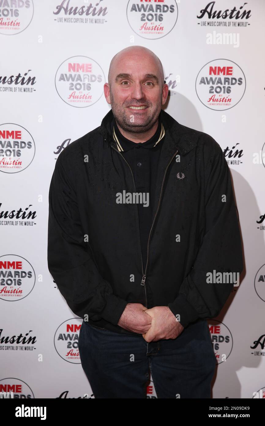 Director Shane Meadows poses for photographers upon arrival at the NME ...
