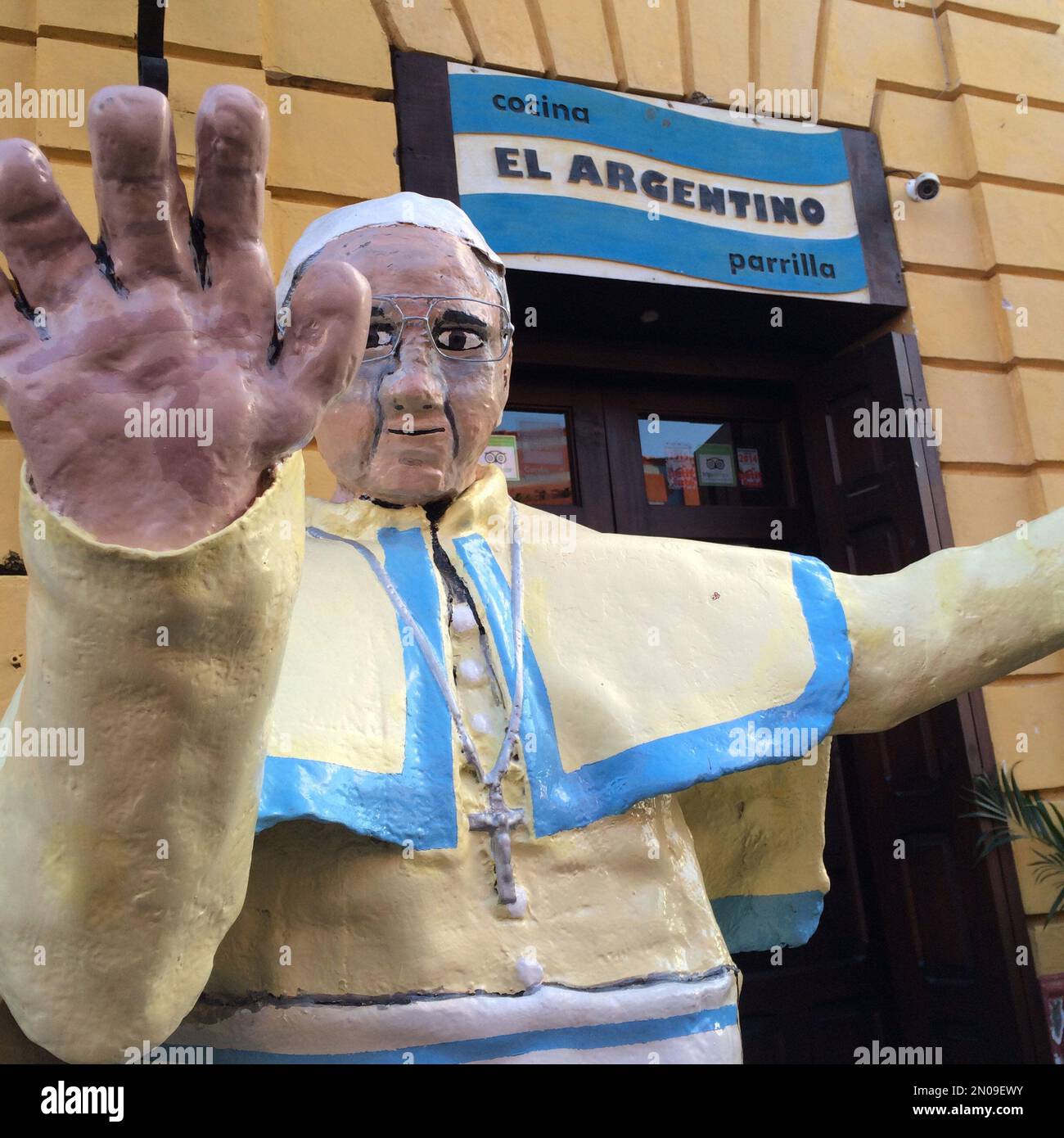 A papier mache statue of Pope Francis stands outside an Argentine ...