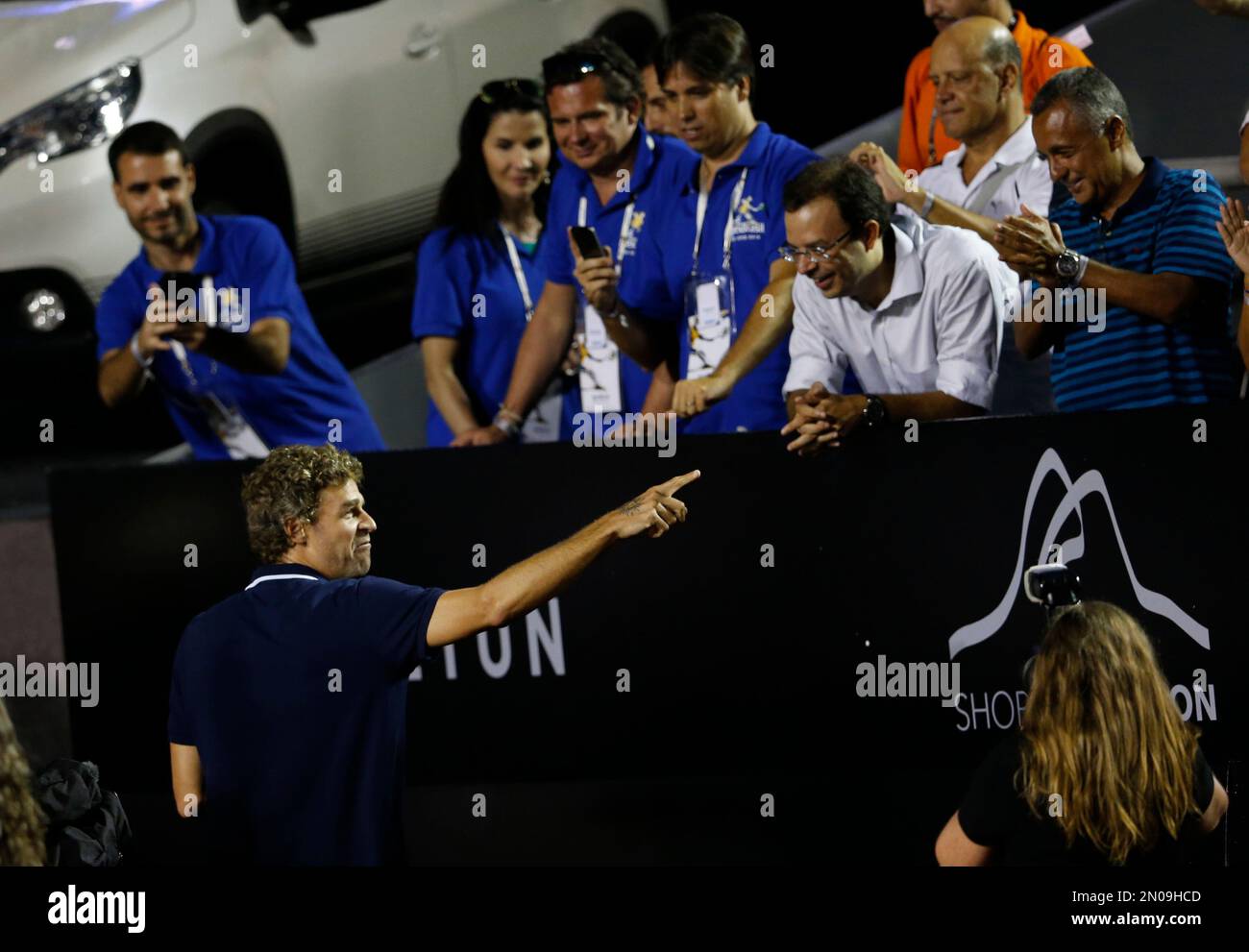Brazilian former tennis player Gustavo 'Guga' Kuerten, left, greets ...