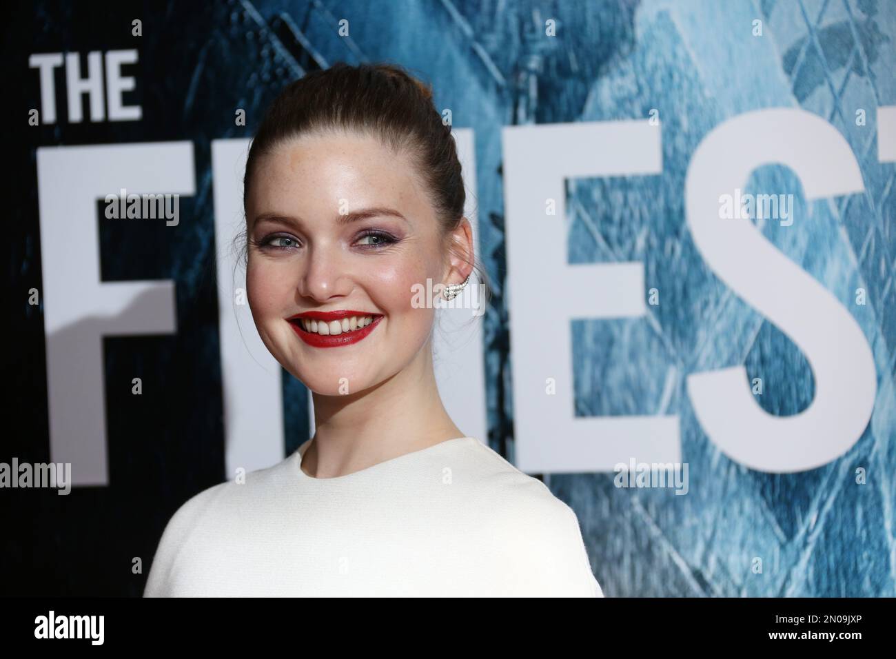 Actress Holliday Grainger poses for photographers upon arrival at the ...