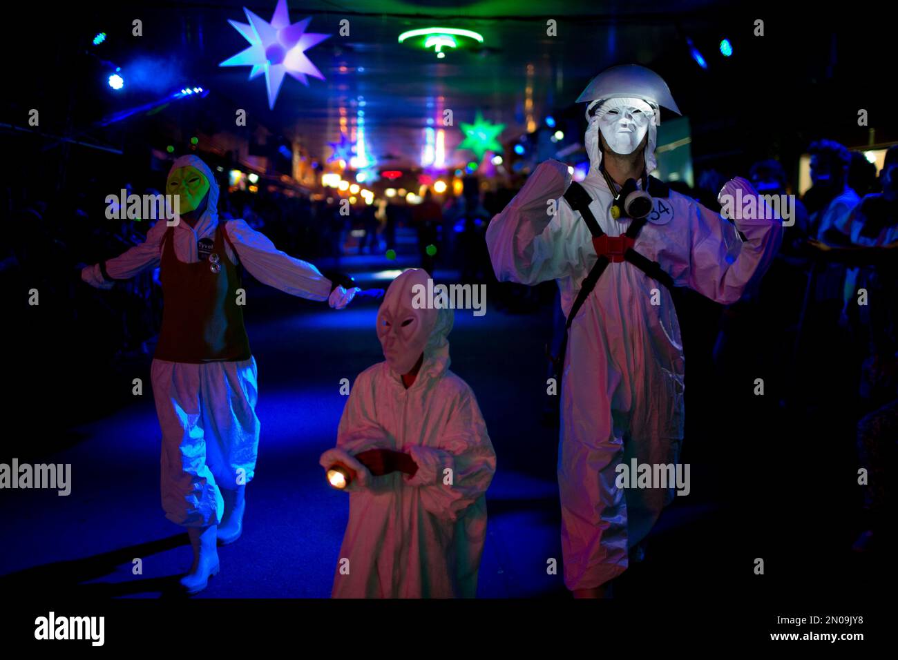 In this Feb. 13, 2016 photo, people in costume parade during the annual ...