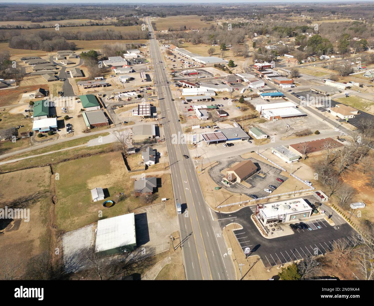 An aerial view of a highway road through a small town Stock Photo - Alamy