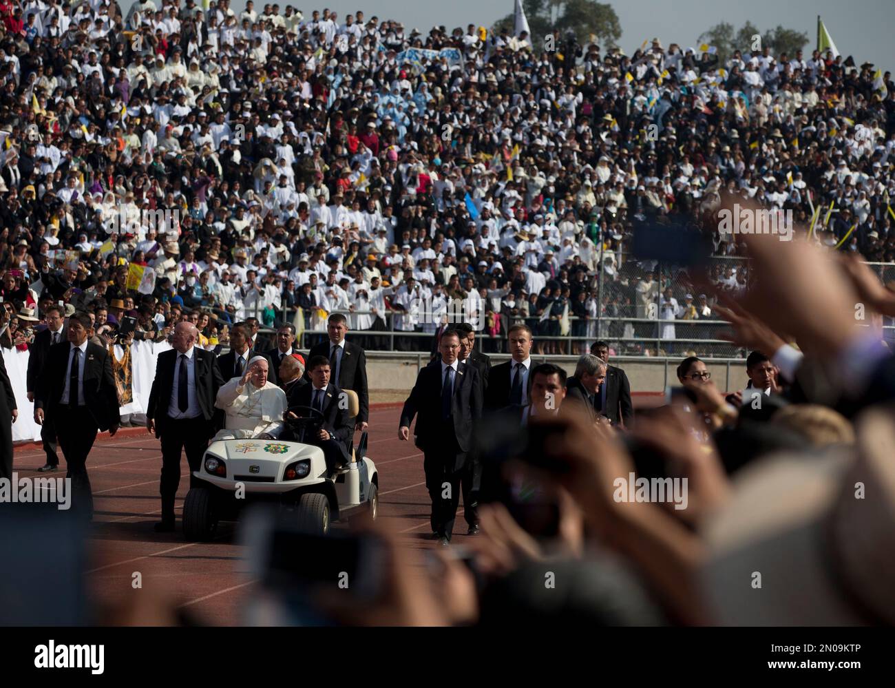 Pope Francis arrives for Mass in a golf cart at Venustiano Carranza ...