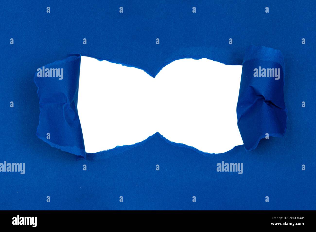 Blue torn sheet of paper with whole space for text Stock Photo - Alamy