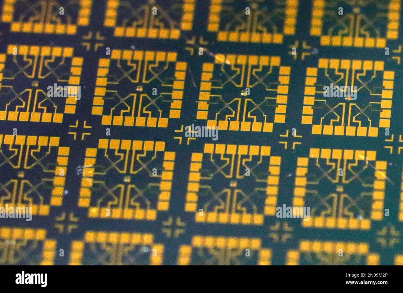 This Tuesday, Jan. 26, 2016 detail photo shows a silicon wafer with ...