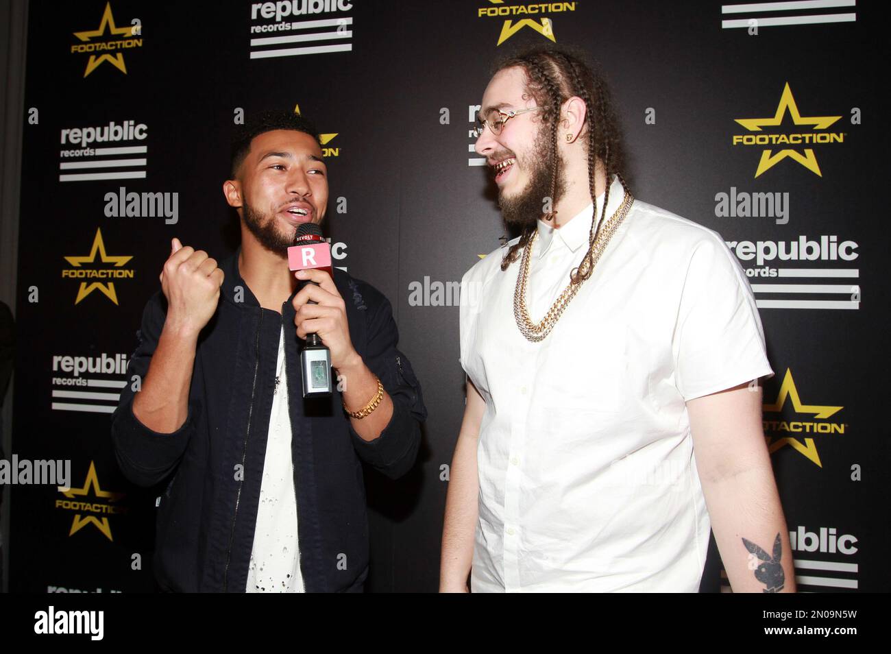 Lawrence Jackson, left, interviews Post Malone at the Republic Records ...
