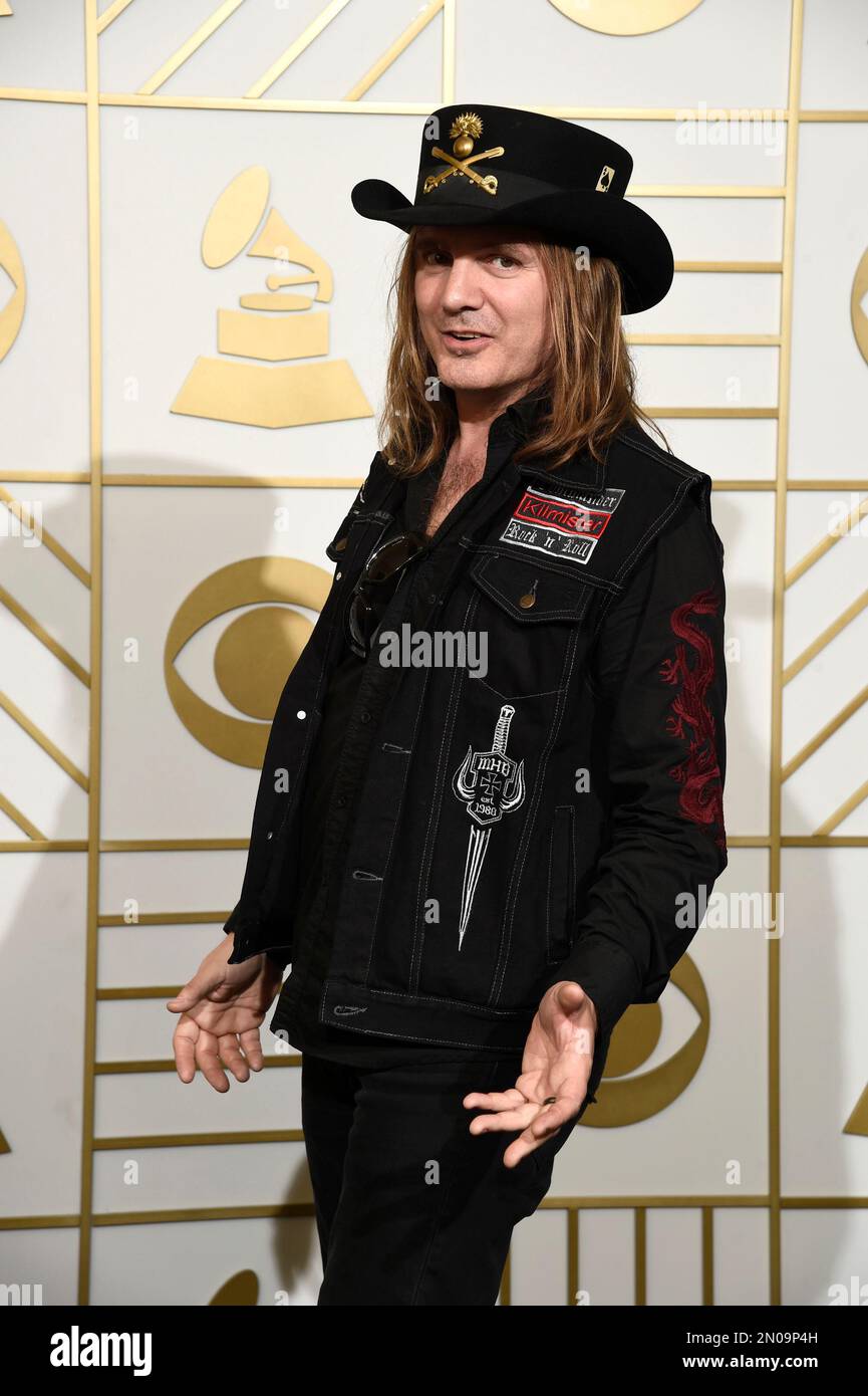 Paul Inder poses in the press room at the 58th annual Grammy Awards at ...