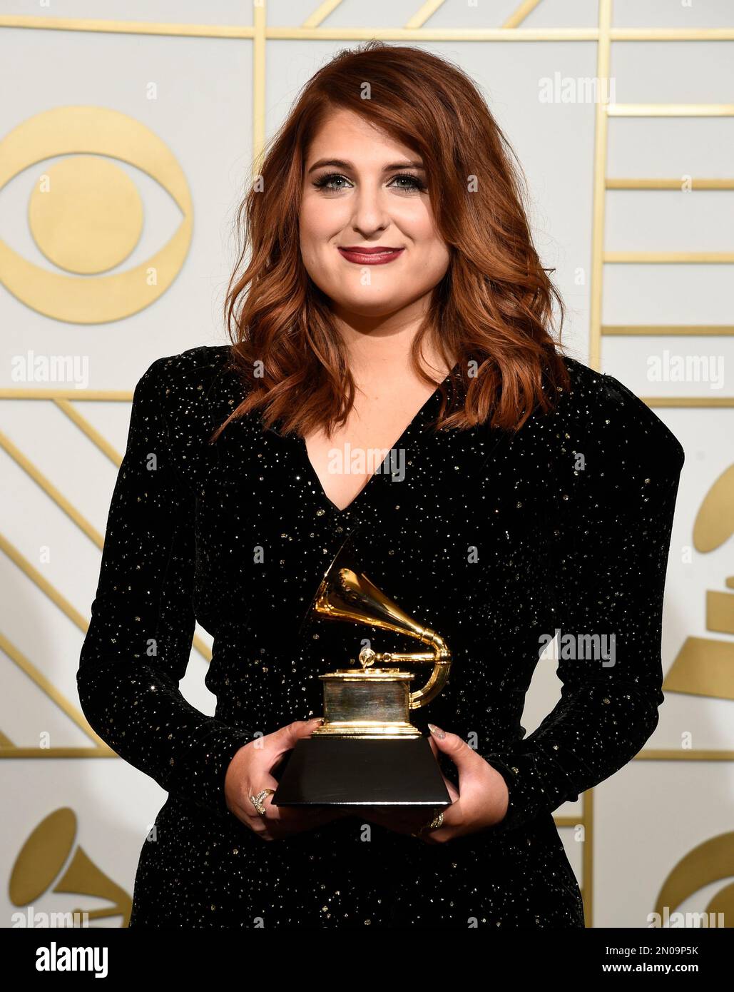 Meghan Trainor poses in the press room with the award for best new ...