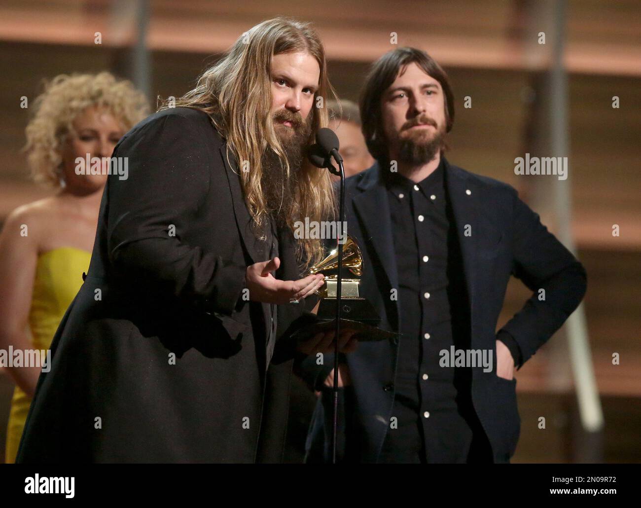 Chris Stapleton, left, and Dave Cobb accept the award for best country ...