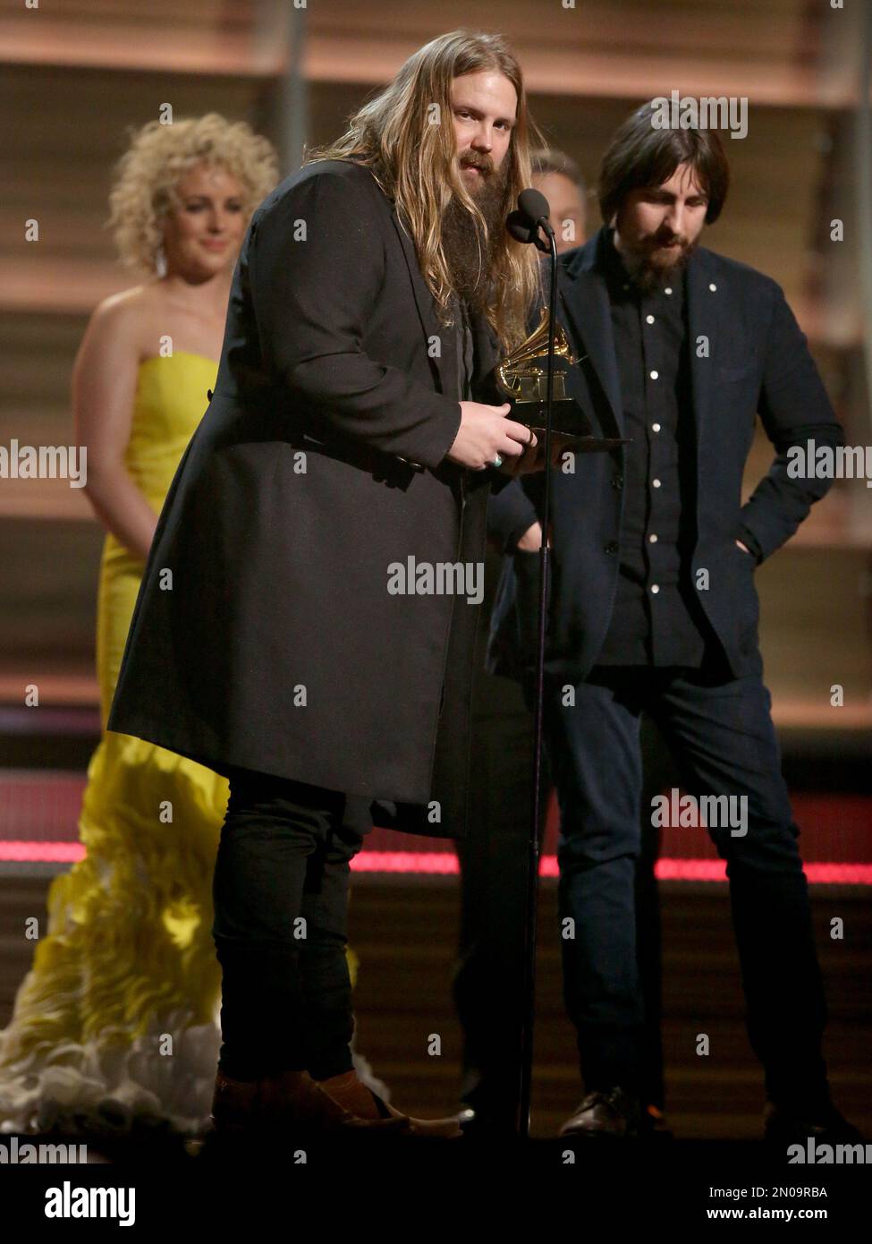 Chris Stapleton, left, and Dave Cobb accept the award for best country ...