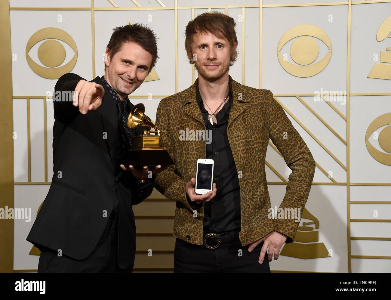 Matt Bellamy, left, and Dominic Howard of Muse pose in the press room ...