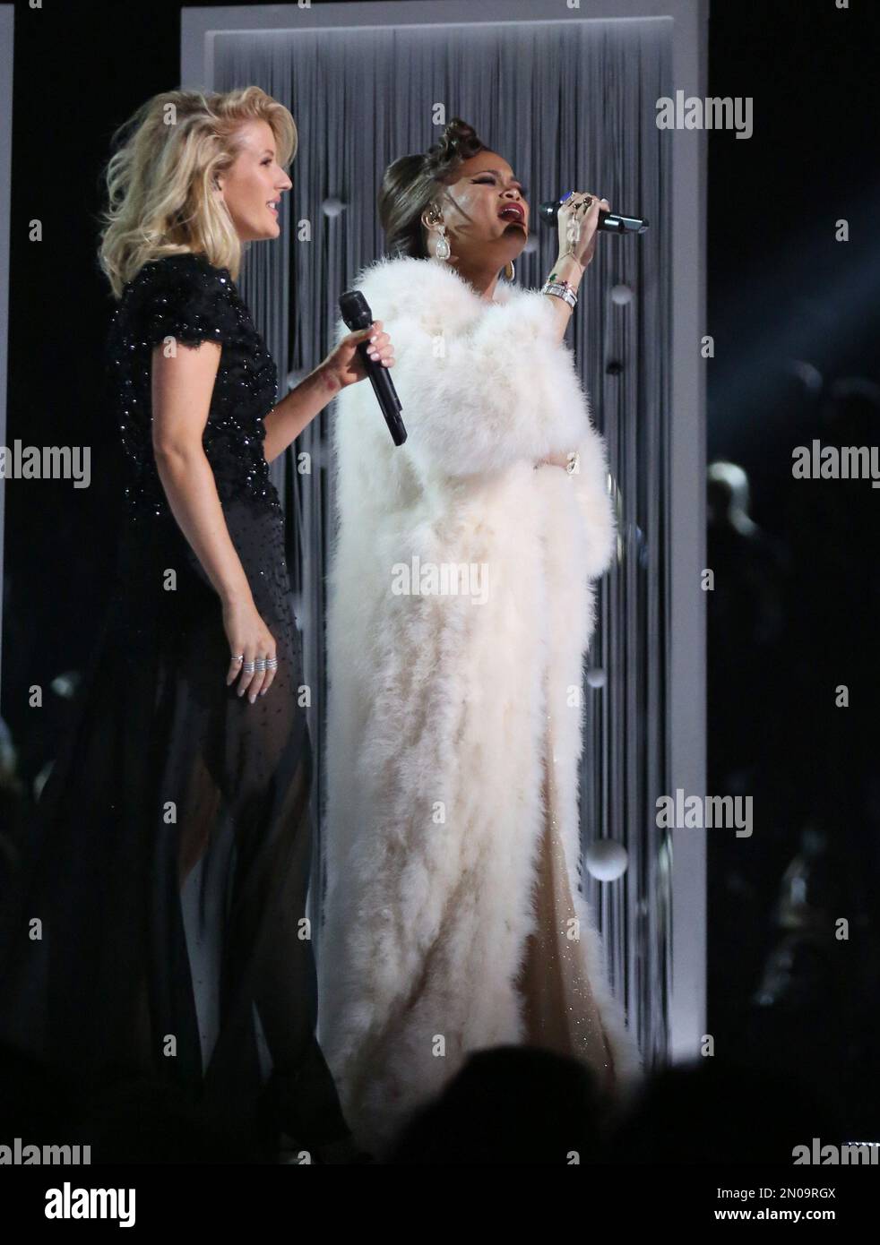 Ellie Goulding, left, and Andra Day perform at the 58th annual Grammy ...