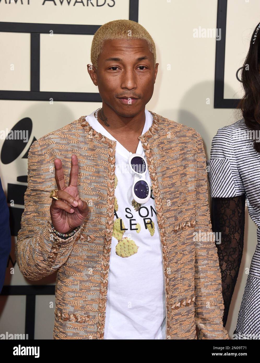 Pharrell Williams arrives at the 58th annual Grammy Awards at the ...