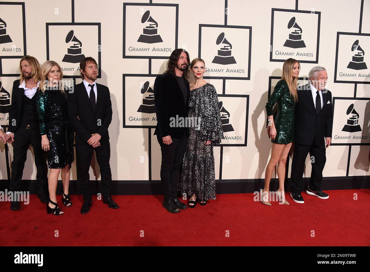 Dave Grohl, left, and Jordyn Blum arrive at the 58th annual Grammy ...