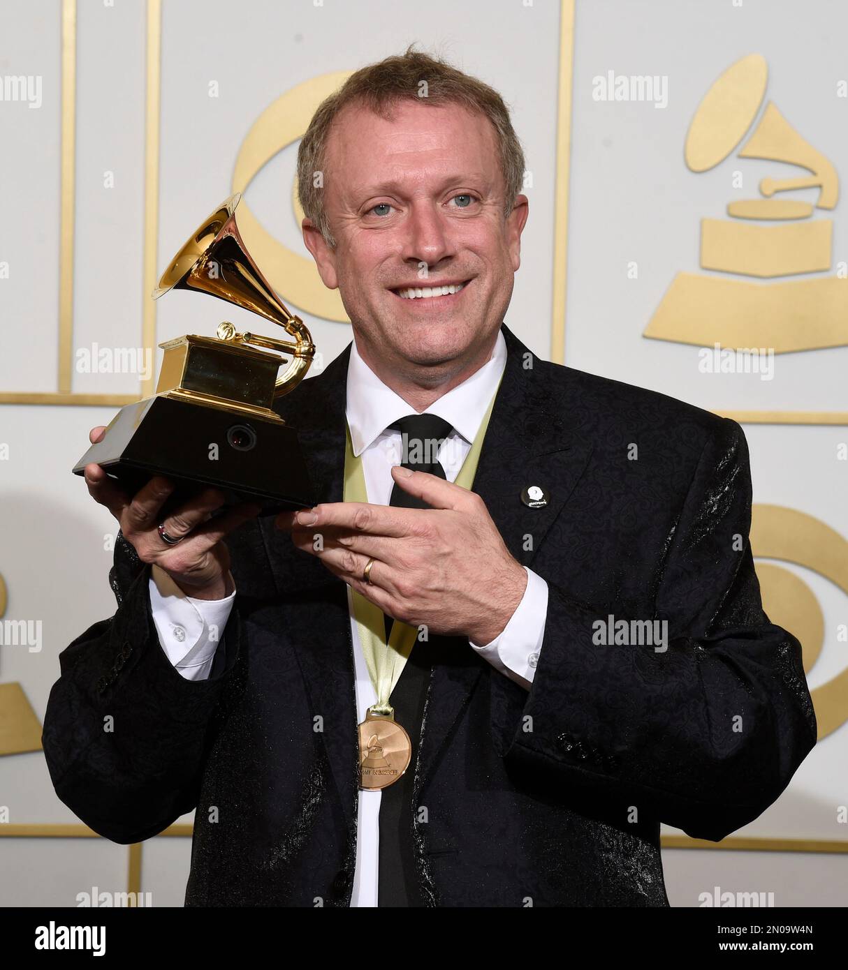 Charles Bruffy poses in the press room with the award for best choral ...