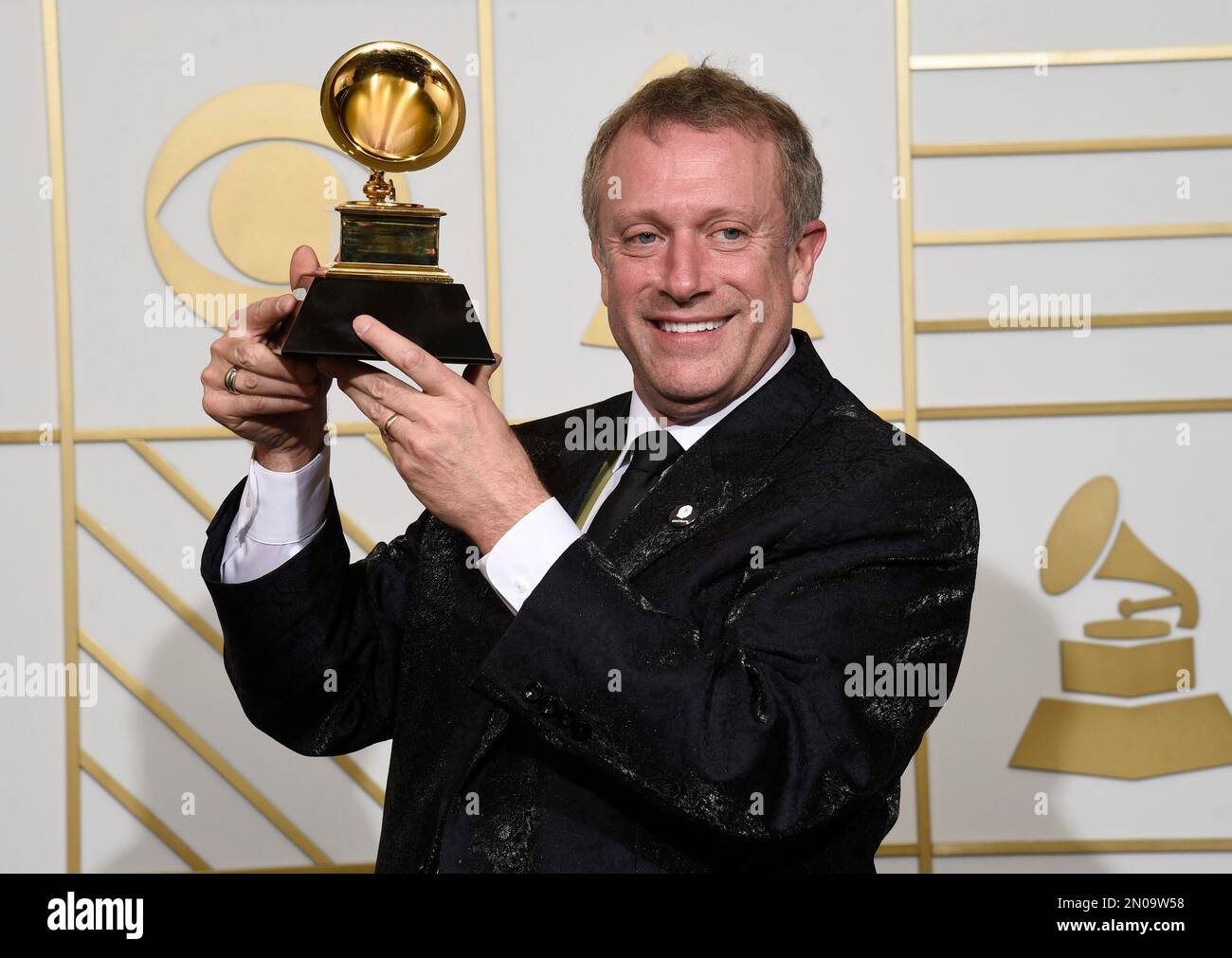 Charles Bruffy poses in the press room with the award for best choral ...