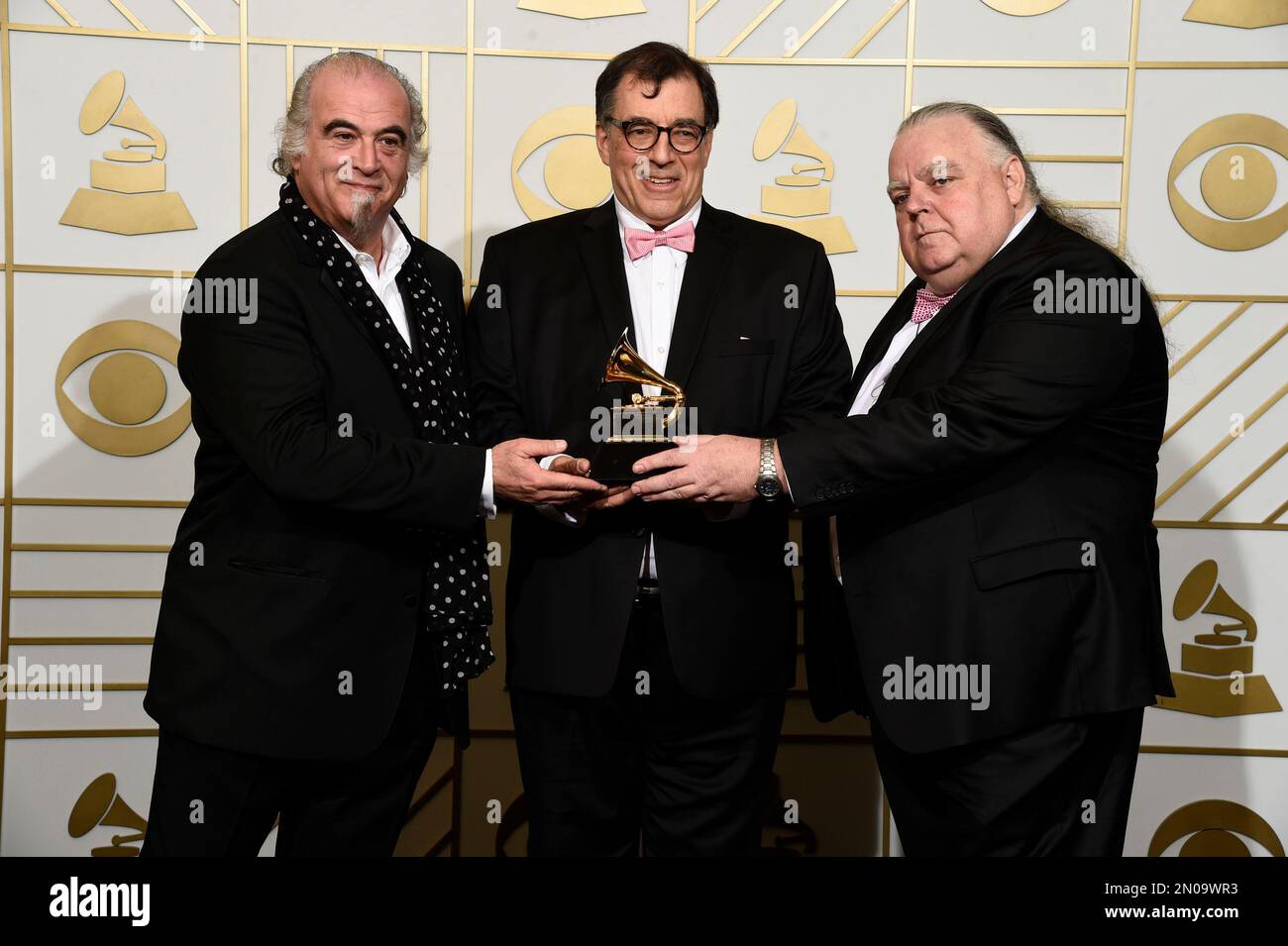Steve Berkowitz, from left, Jan Haust, and Peter J. Moore pose in the ...